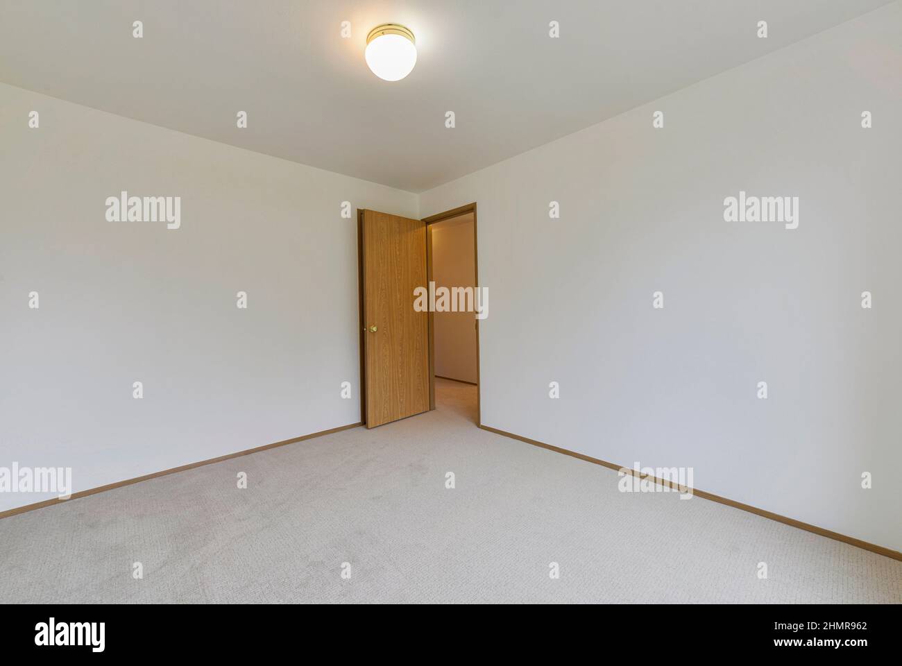 Modern residential empty bedroom interior Stock Photo - Alamy