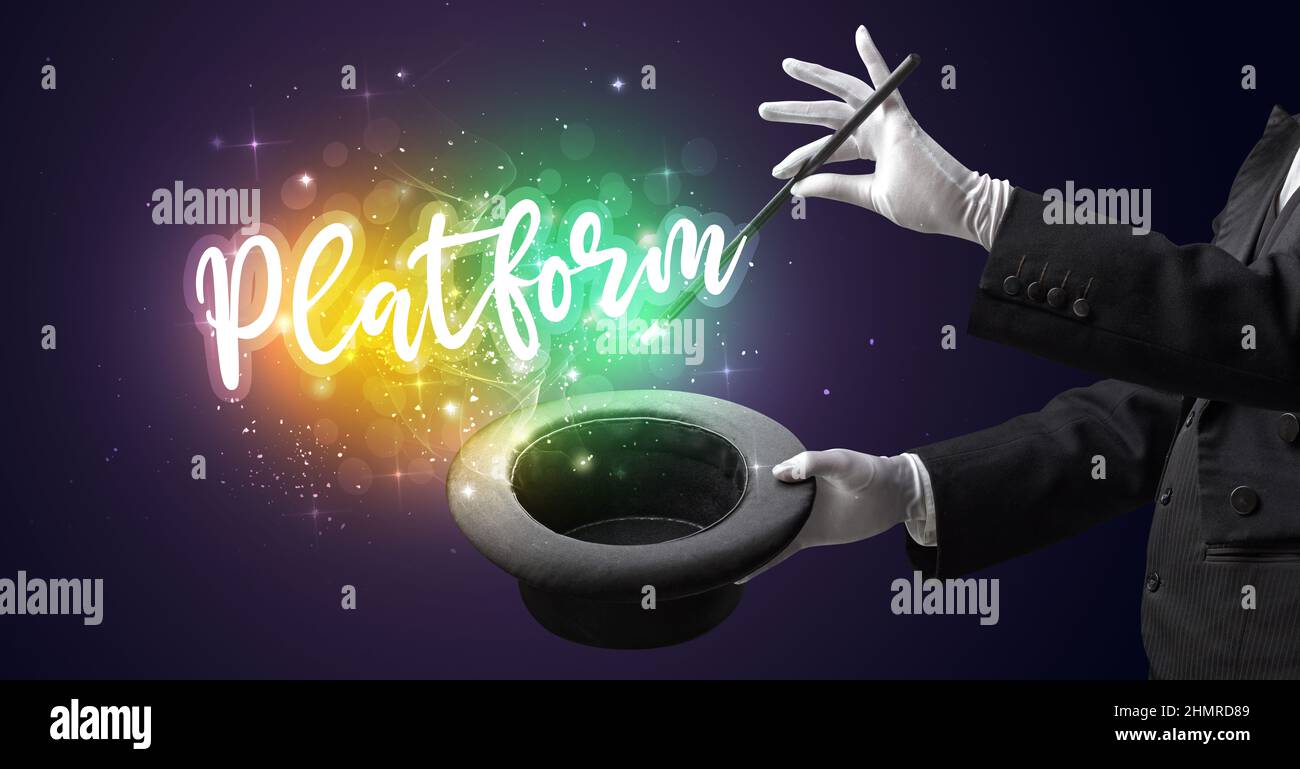 Young magician is showing magic trick Stock Photo - Alamy