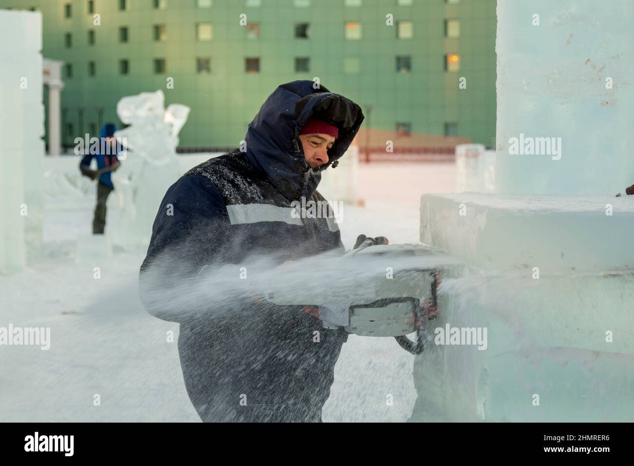 Workman assembler customize chainsaw ice plate Stock Photo - Alamy