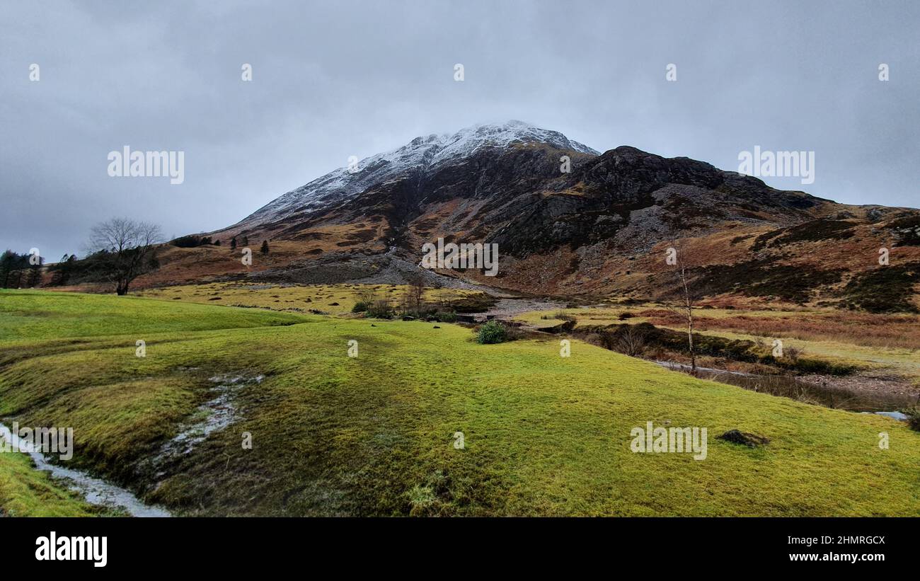 Mountain valley against cloudy hi-res stock photography and images - Alamy