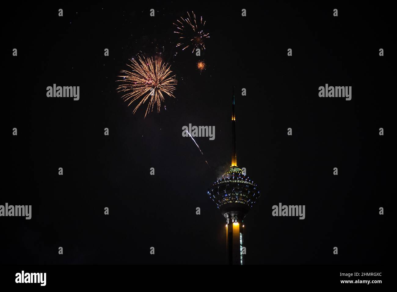 Tehran, Tehran, Iran. 10th Feb, 2022. Plenty of orange fireworks shot ...