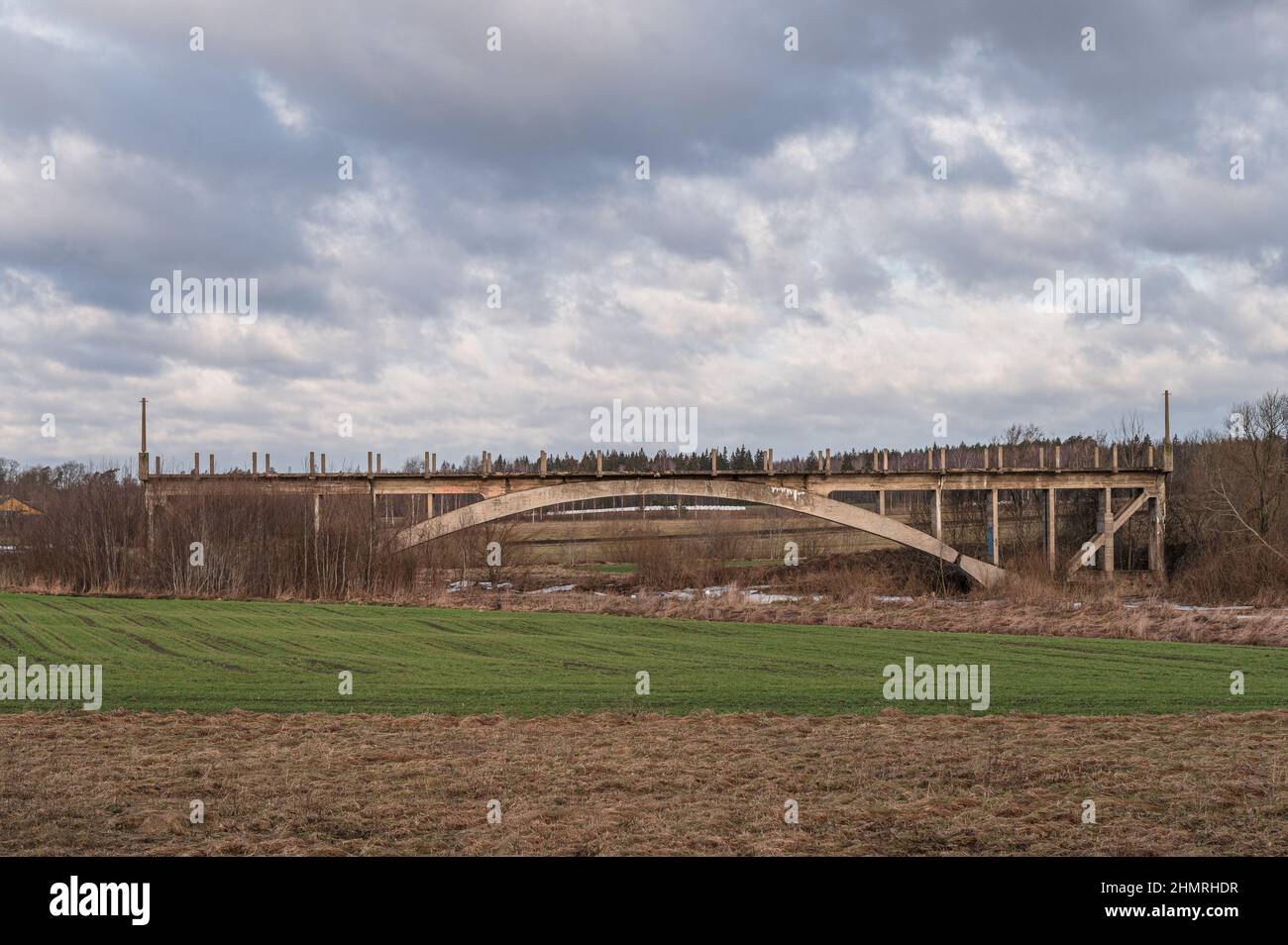 abandoned unfinished bridge over the river arched which was intended ...