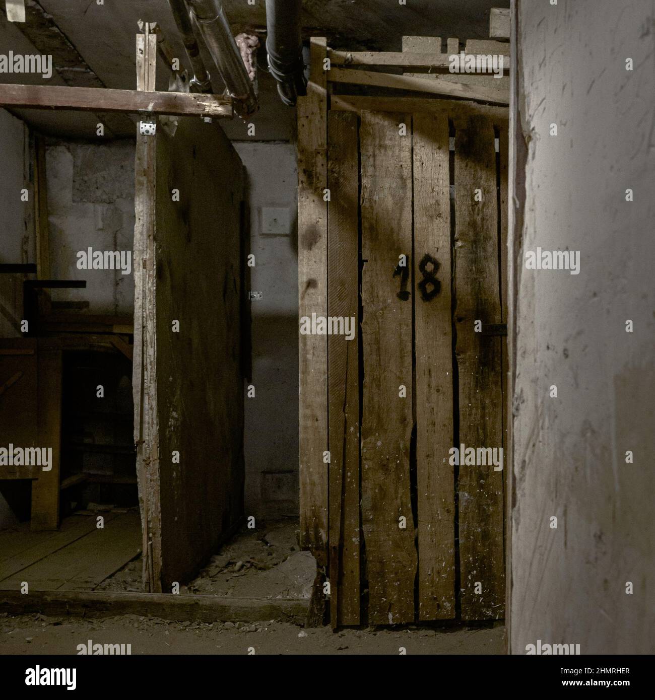 abandoned basement with electricity and sewers in the basement of a ...