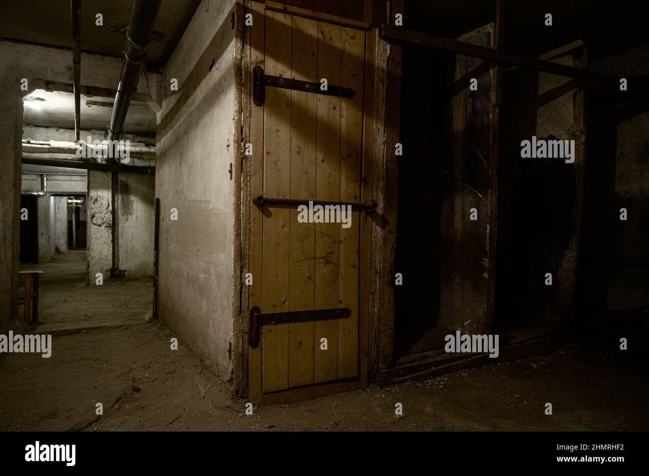 abandoned basement with electricity and sewers in the basement of a ...