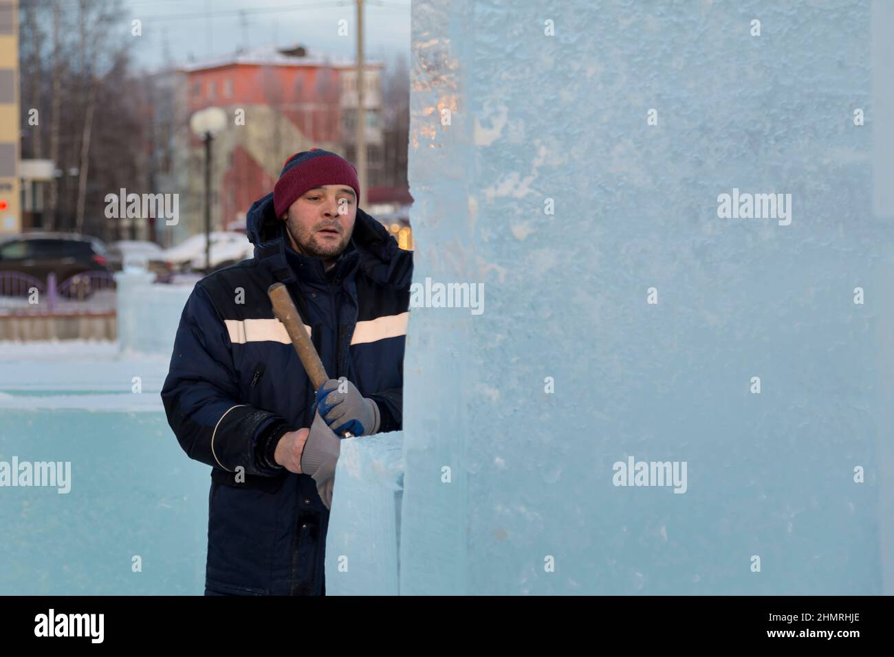 Worker with a chisel in his hand at a construction site Stock Photo - Alamy