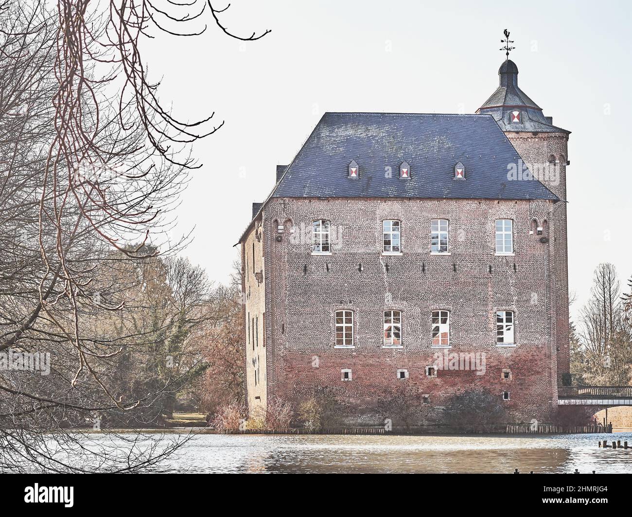 Old church by a lake in Geilenkirchen, Germany Stock Photo - Alamy