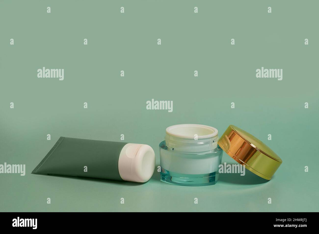 An open jar of face cream, a tube of hand cream Stock Photo - Alamy
