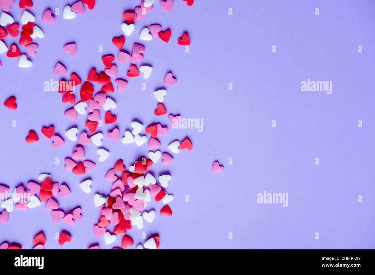 Valentines day concept many little hearts in violet background Stock ...