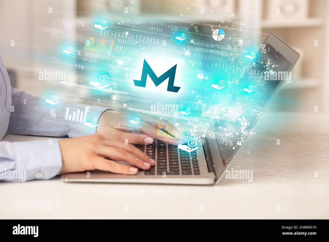 Young man watching stock market on laptop Stock Photo - Alamy