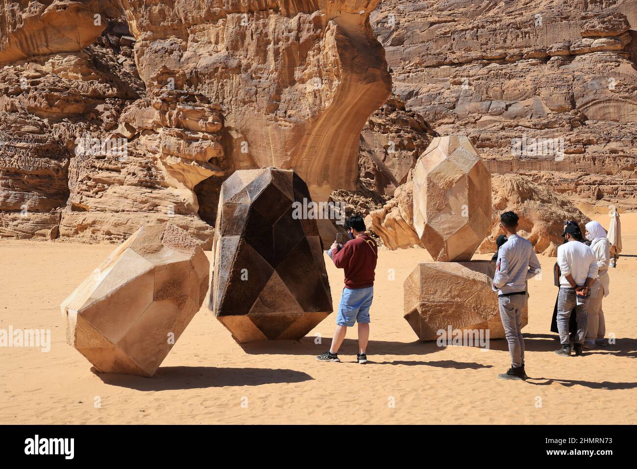 Alula, Saudi Arabia. 11th Feb, 2022. People view artworks during the ...