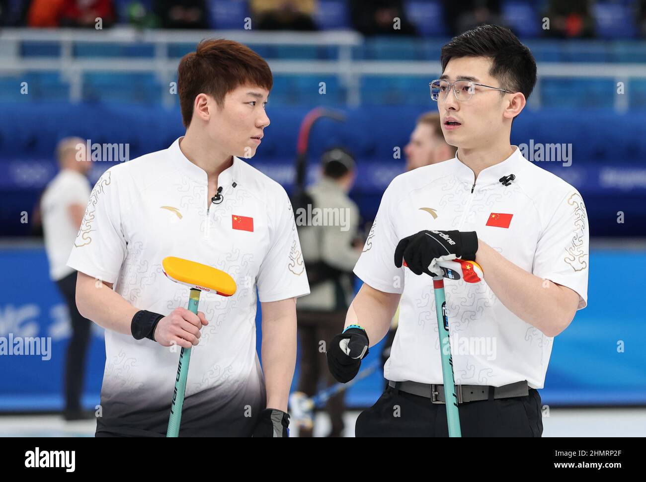 Beijing, China. 12th Feb, 2022. Wang Zhiyu (L) and Xu Jingtao of China ...