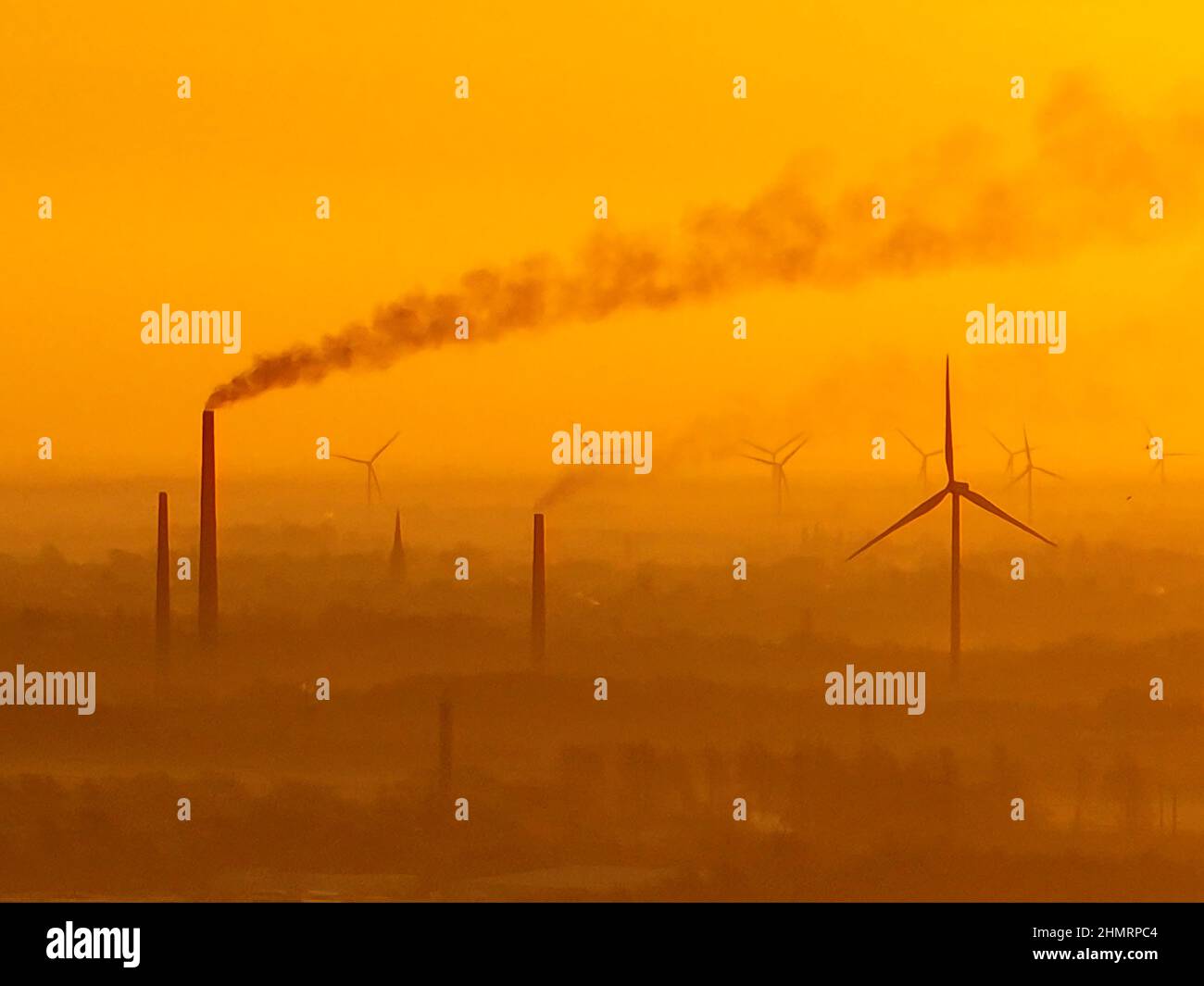Peterborough, UK. 11th Feb, 2022. An orange scene at sunrise, behind ...