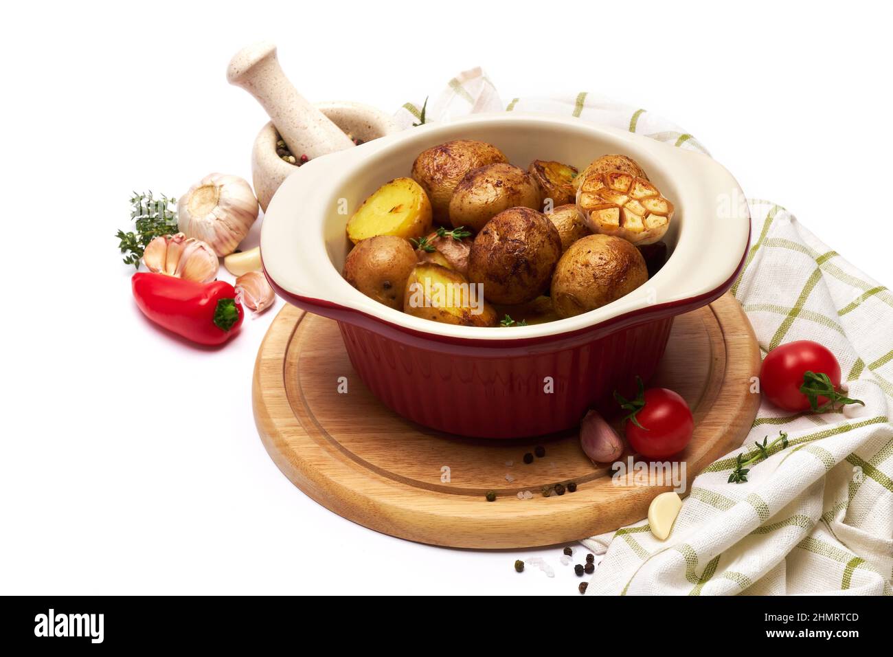 Baked potato in a clay pot isolated on white background Stock Photo - Alamy