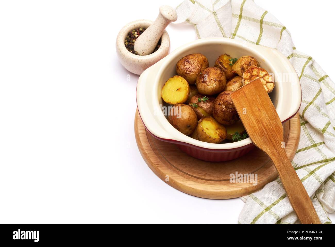 Baked potato in a clay pot isolated on white background Stock Photo - Alamy