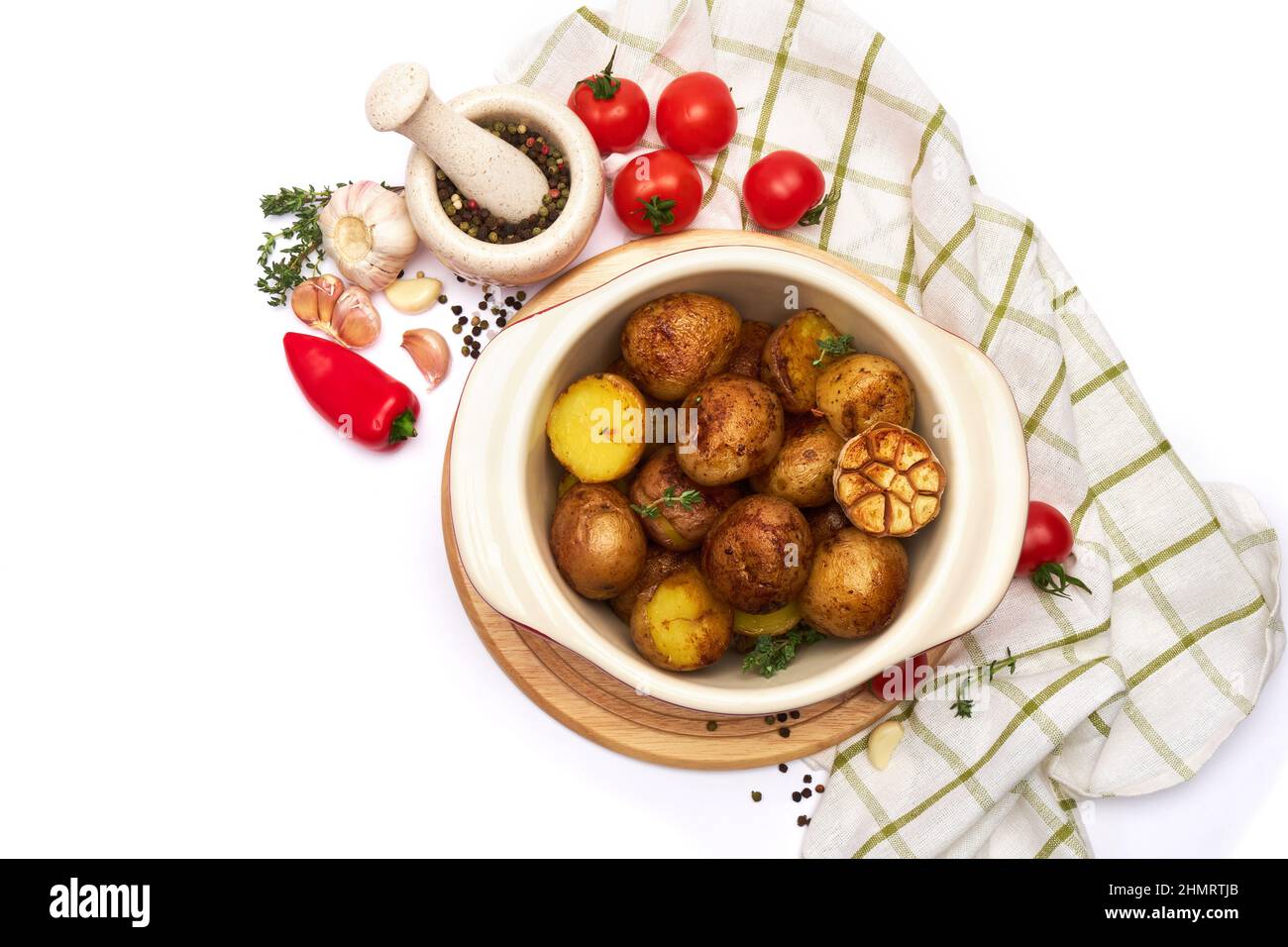 Baked potato in a clay pot isolated on white background Stock Photo - Alamy