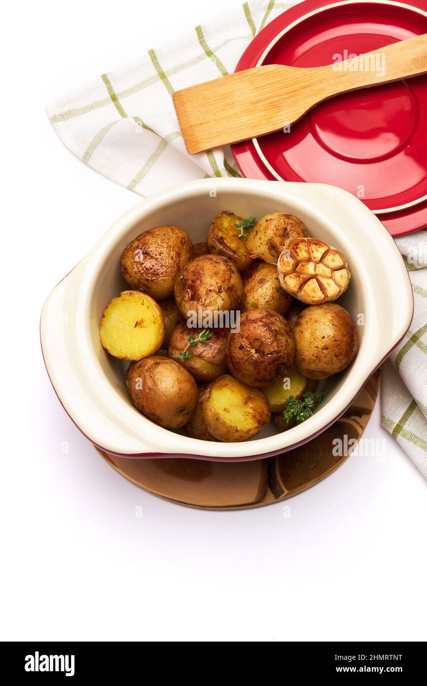 Baked potato in a clay pot isolated on white background Stock Photo - Alamy