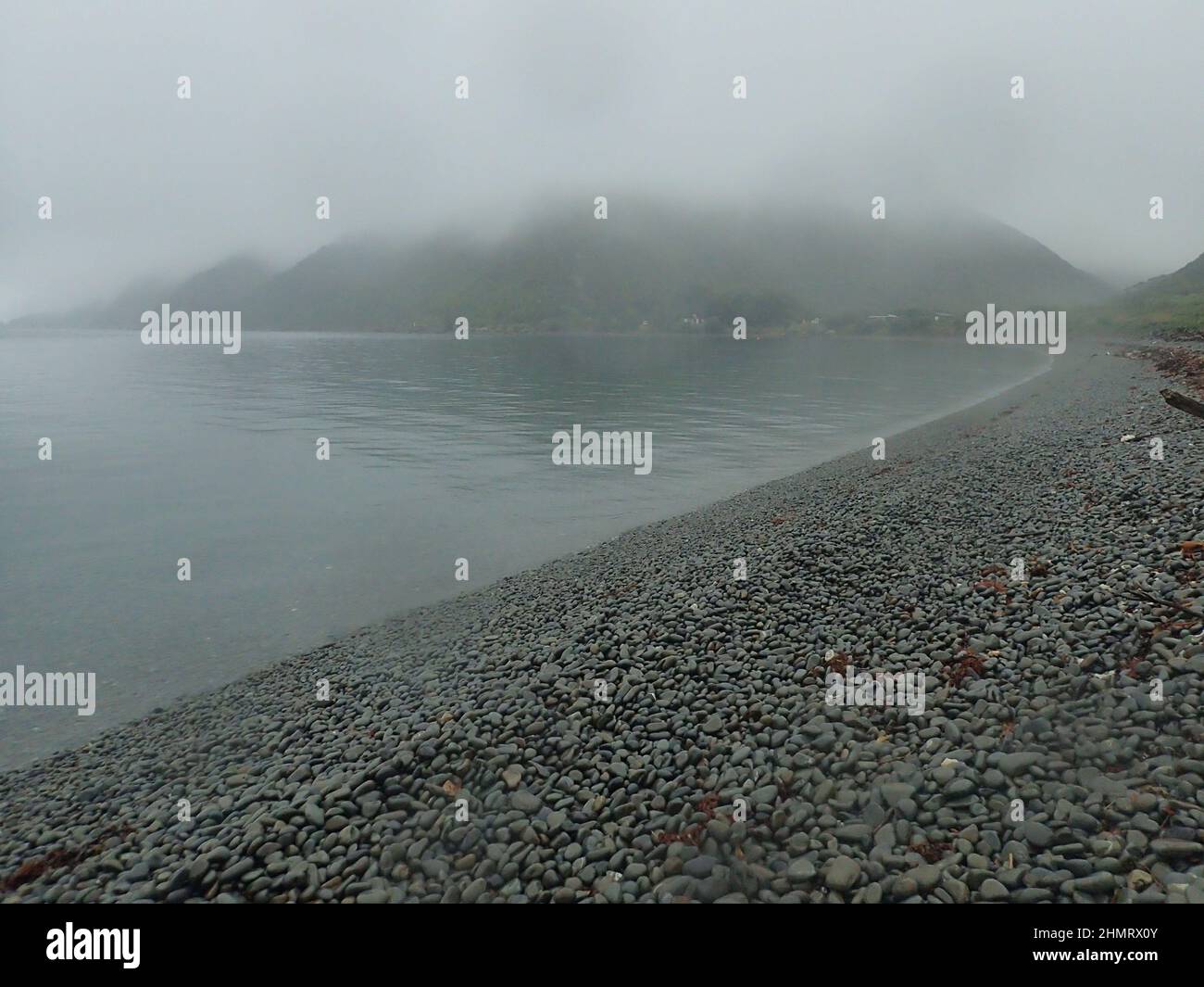 Low cloud and rain at the Waioura Bay Maori settlement on Kapiti Island ...