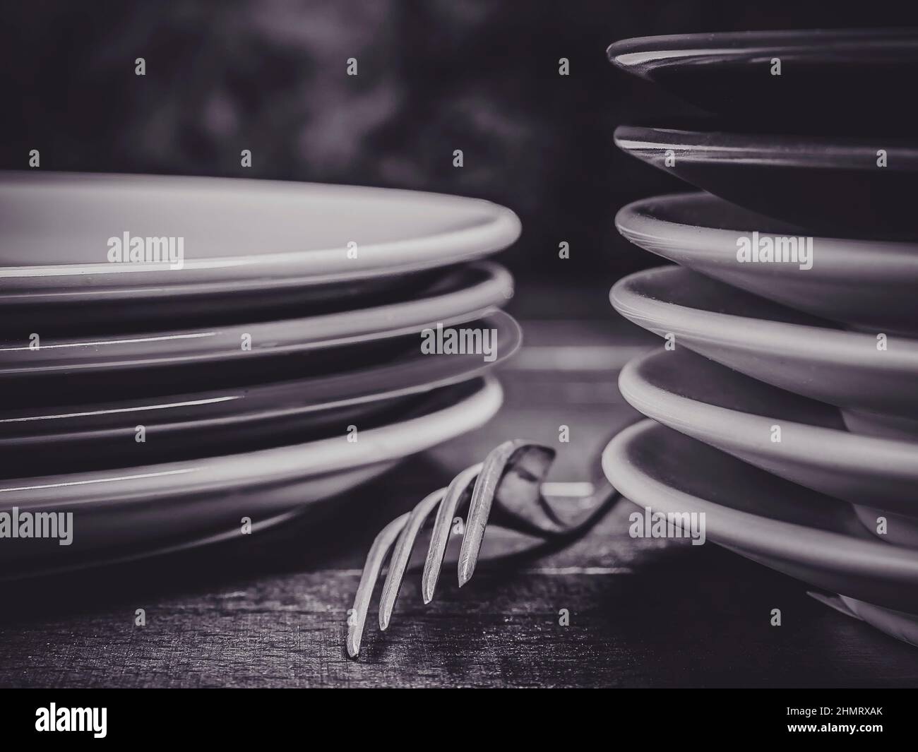 Empty stacked plates hi-res stock photography and images - Alamy