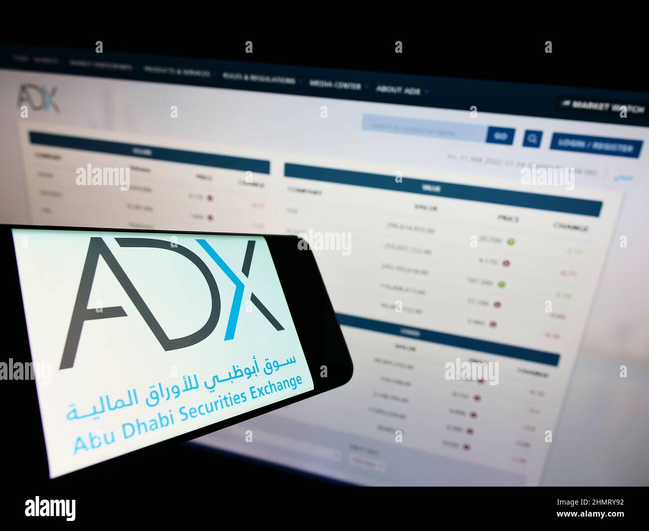Mobile phone with logo of company Abu Dhabi Securities Exchange (ADX ...