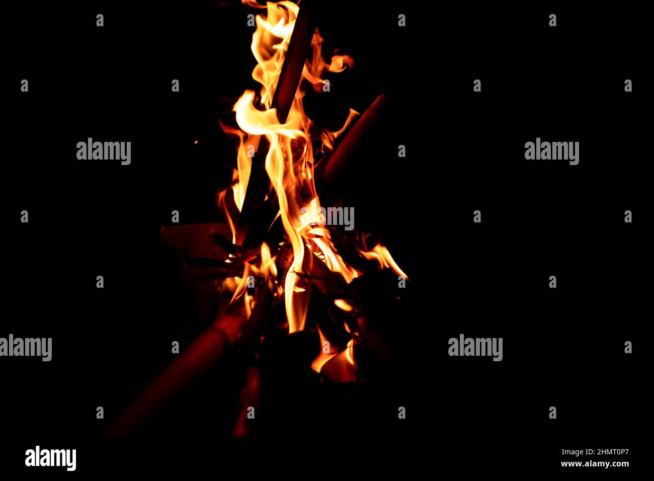 Beautiful formation of fire created by burning some dry reeds forming ...