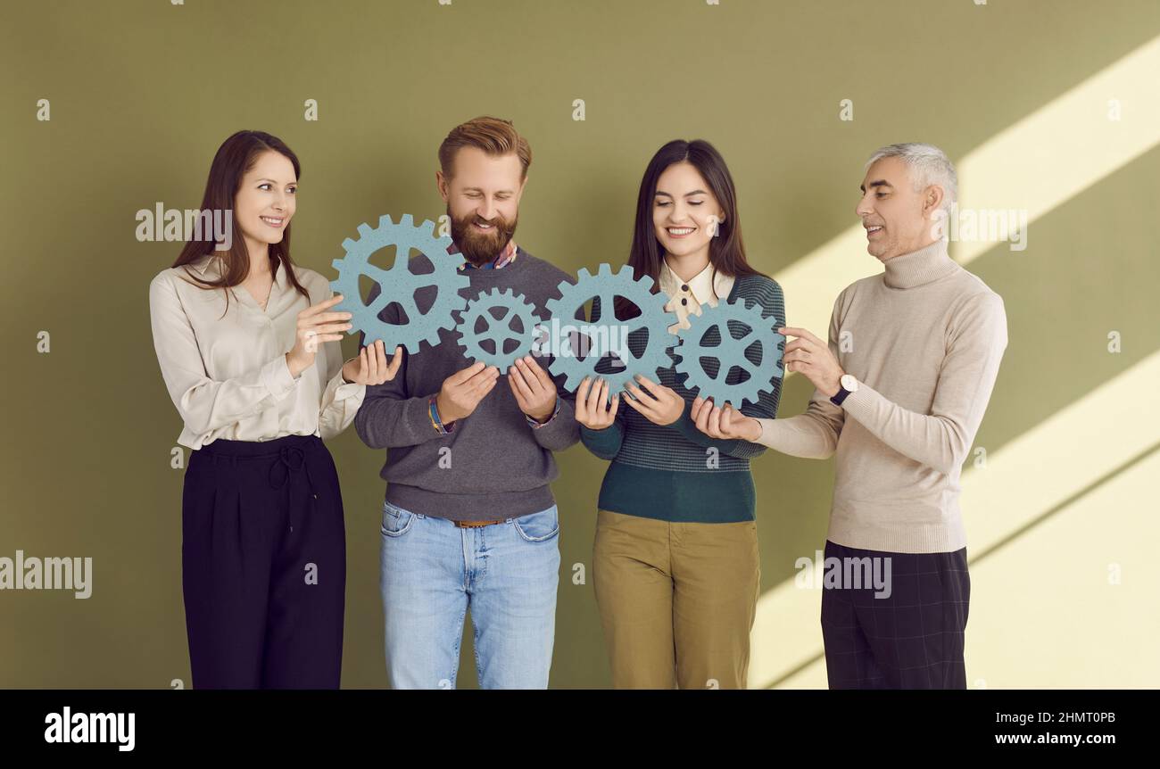 Teamwork collaboration unity corporate gear hi-res stock photography ...