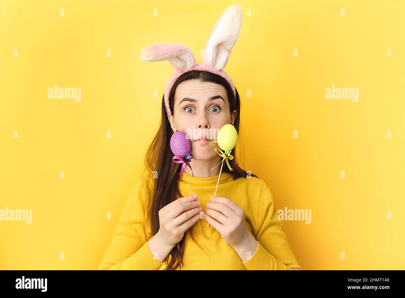 Happy funny beautiful smiling young woman 20s wearing rabbit ears ...