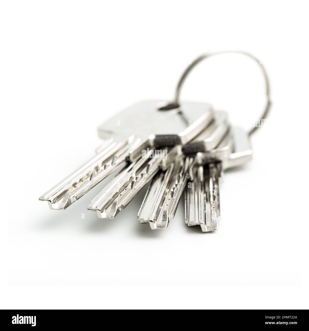 group of silver keys isolated on white background Stock Photo - Alamy