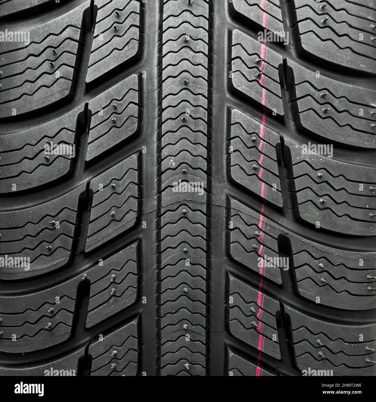 Winter Car tires close-up wheel profile structure on white background Stock Photo - Alamy