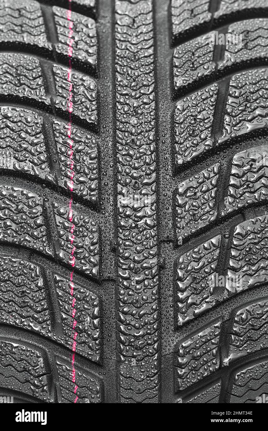 Car tires close-up Winter wheel profile structure with water drops on white background Stock ...