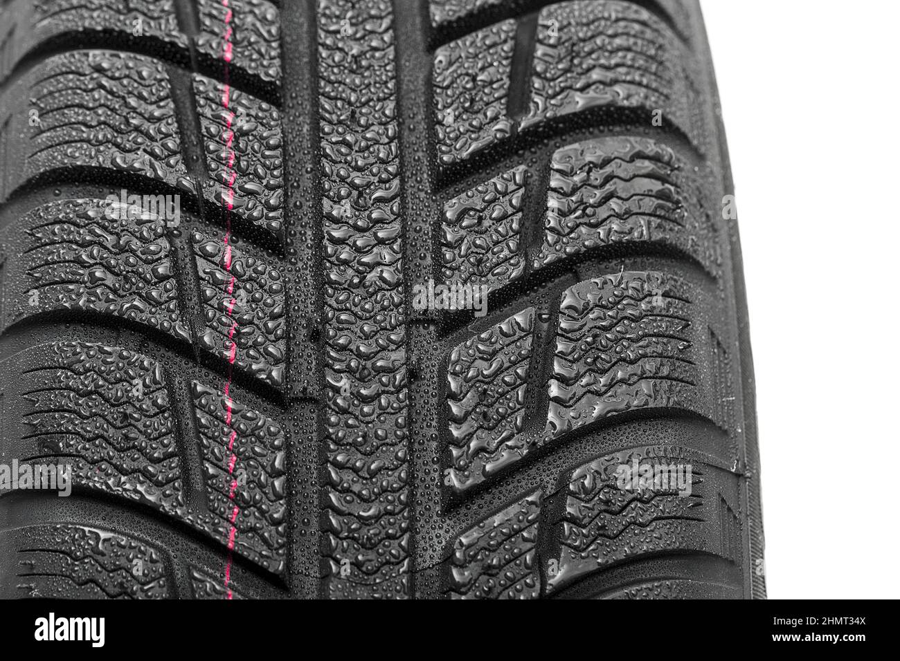 Car tires close-up Winter wheel profile structure with water drops on white background Stock ...