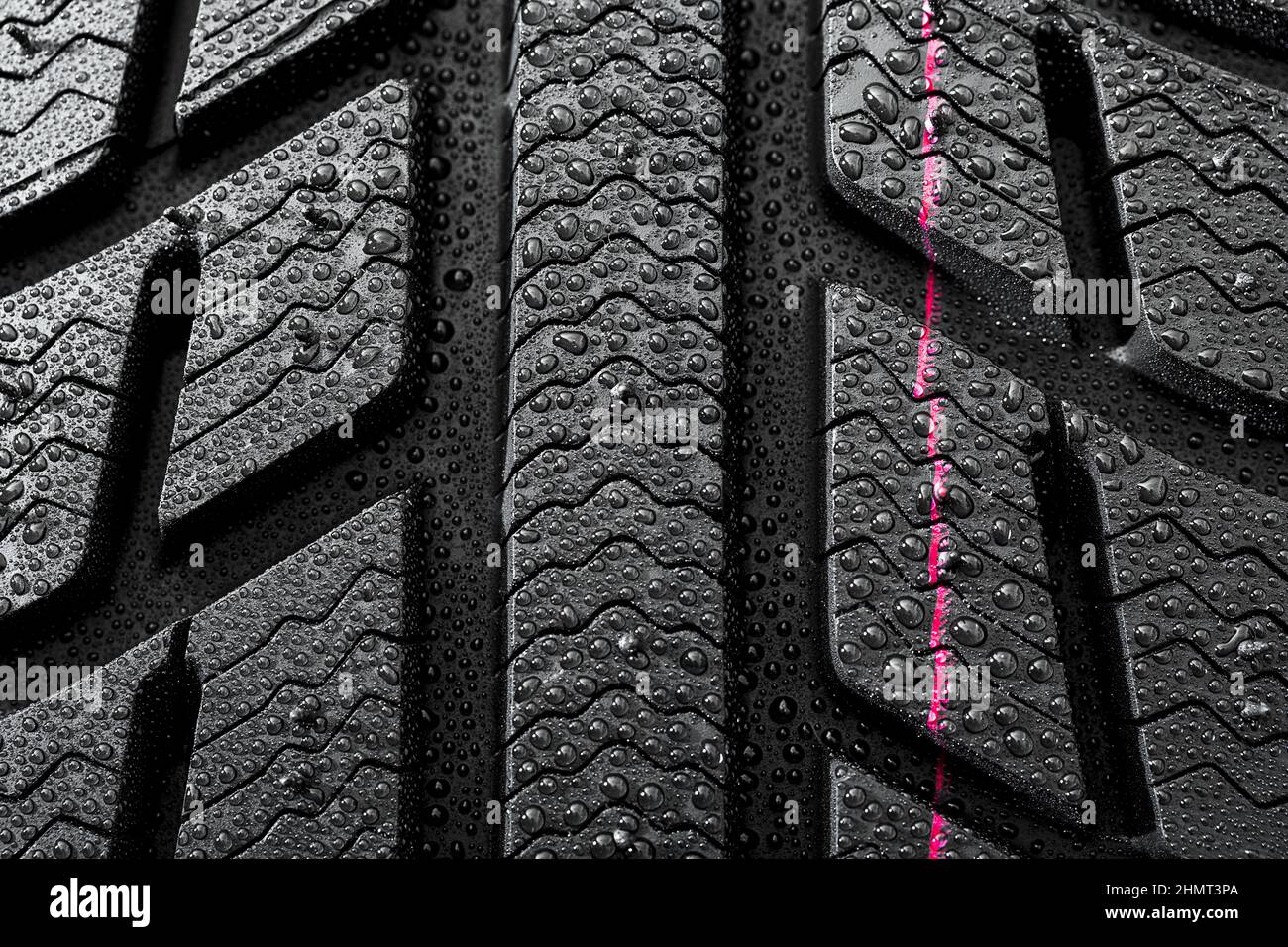 Car tires close-up Winter wheel profile structure with waterdrops Stock Photo - Alamy