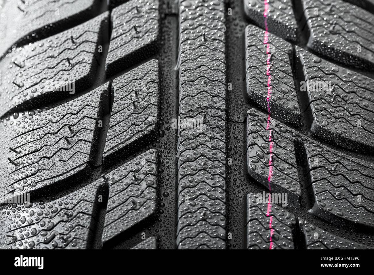 Car tires close-up Winter wheel profile structure with waterdrops Stock ...