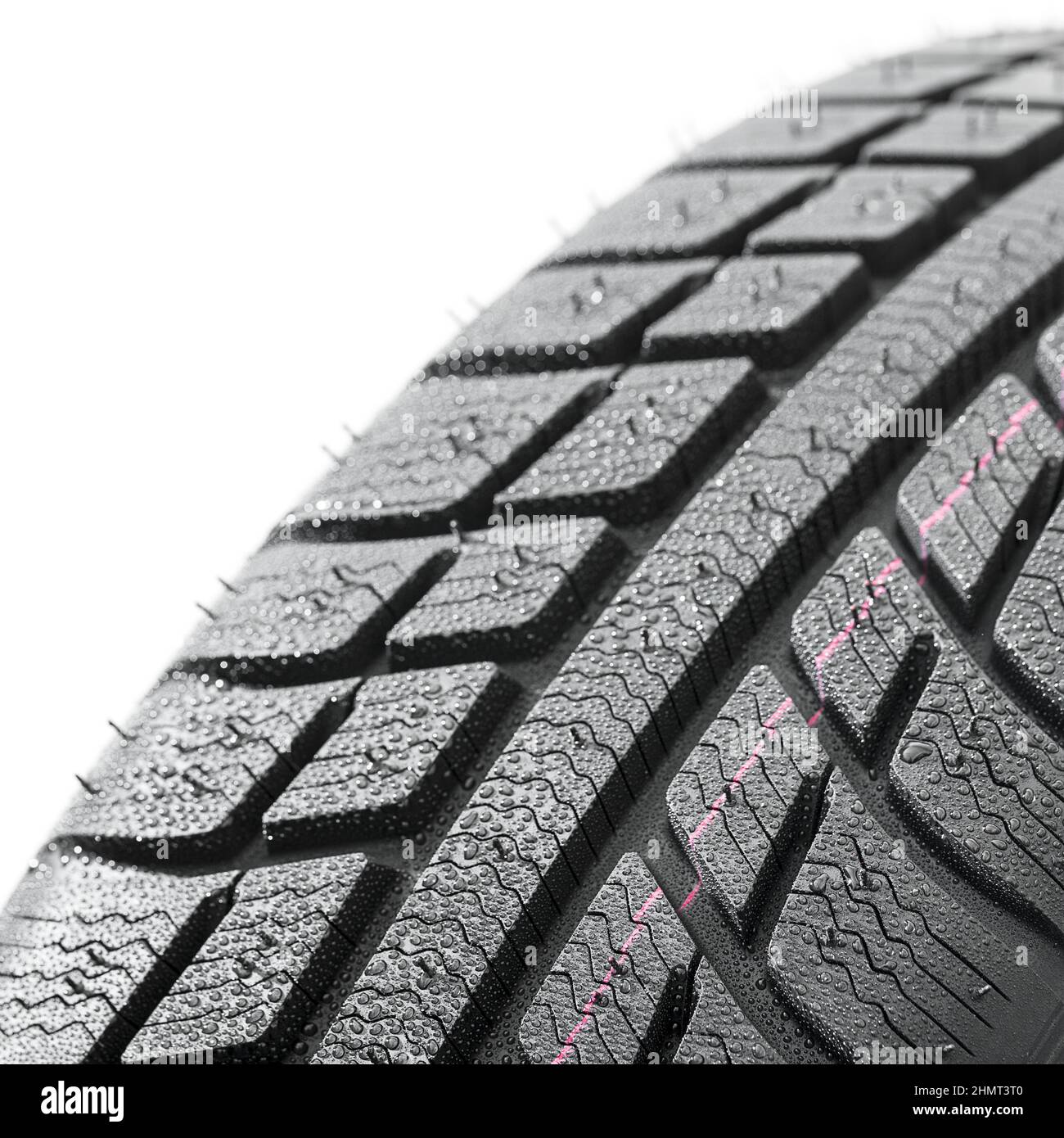 Car tires close-up Winter wheel profile structure with water drops on white background Stock ...