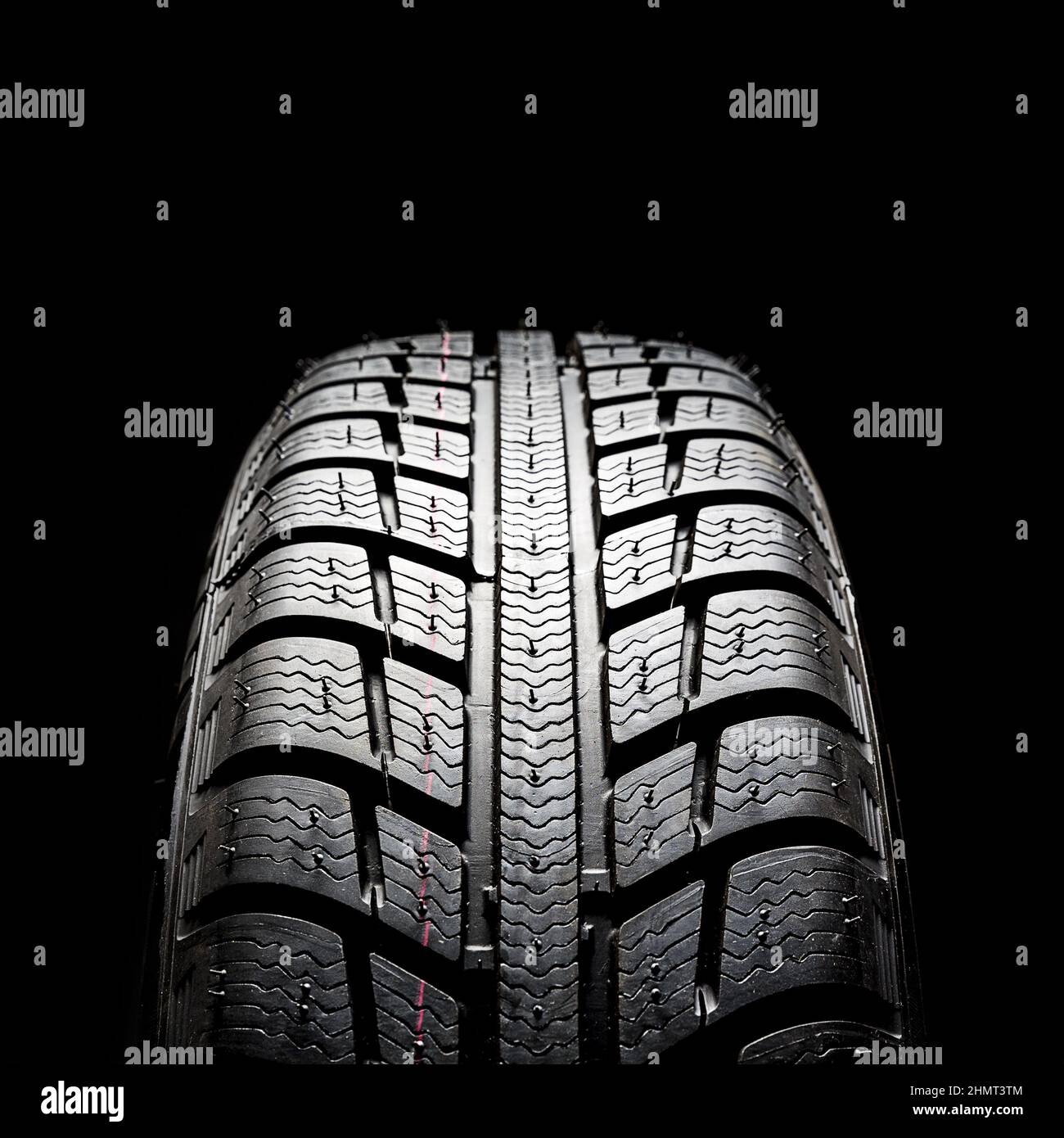 Winter Car tires close-up wheel profile structure on black background Stock Photo - Alamy