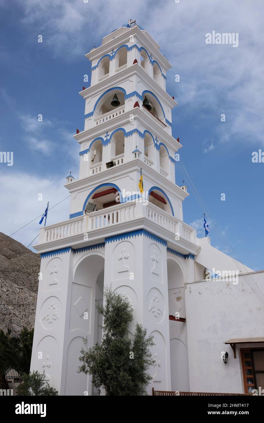 View of the beautiful white and blue church Holy Cross, in Perissa ...