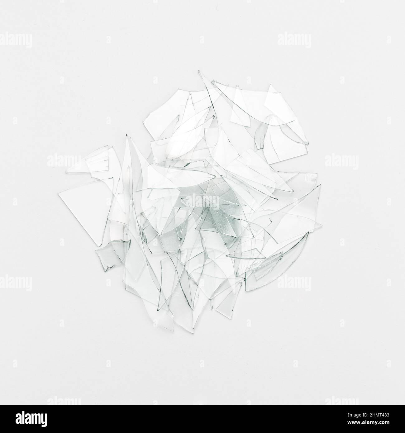glass shards Broken window heap on white gray background Stock Photo ...