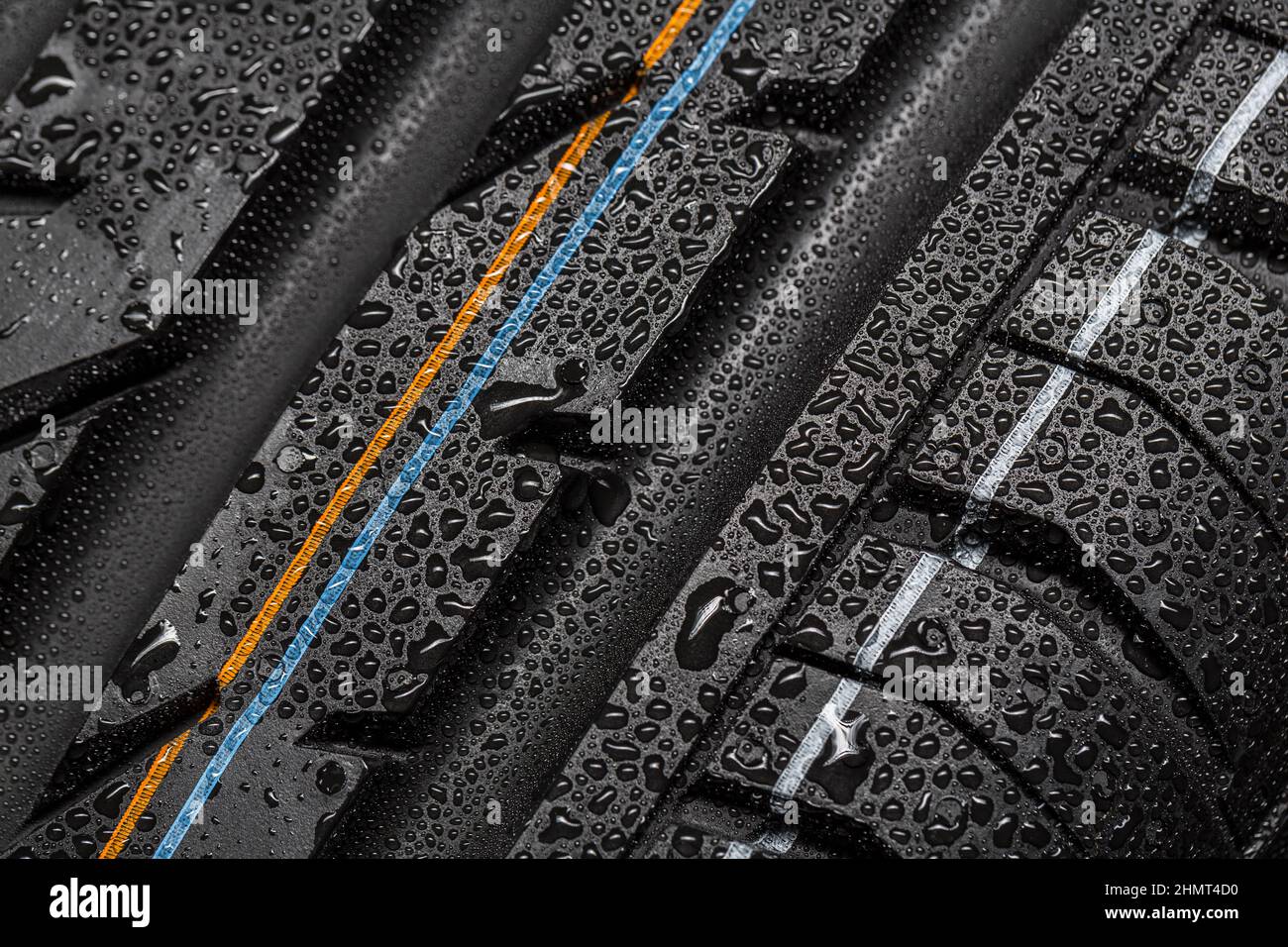 Car tire aquaplaning risk tire with raindrops Stock Photo - Alamy