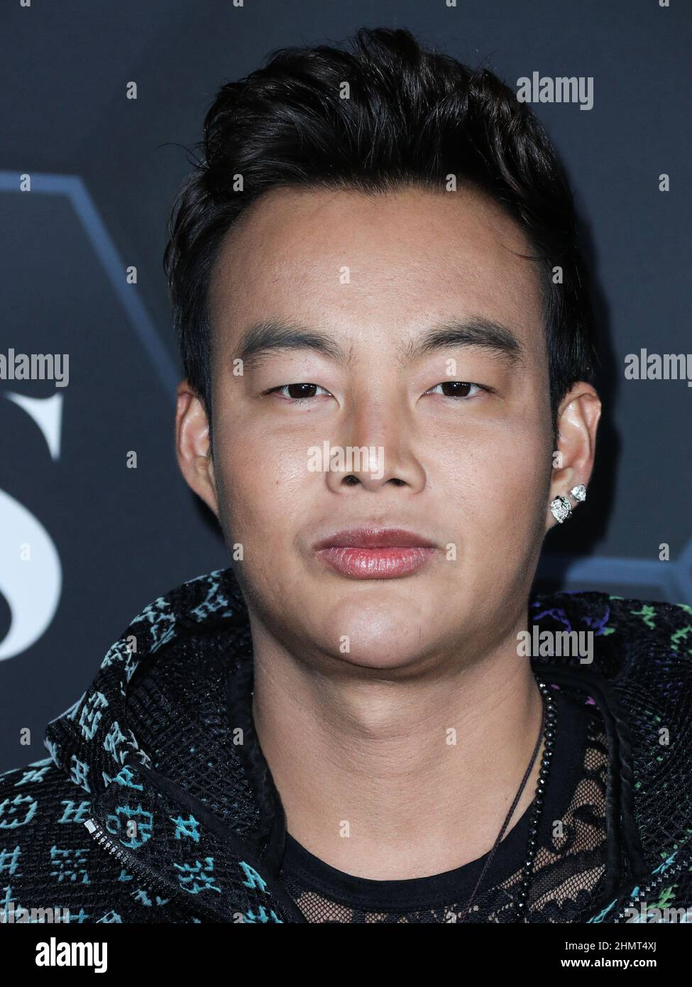 HOLLYWOOD, LOS ANGELES, CALIFORNIA, USA - FEBRUARY 11: Kane Lim arrives ...