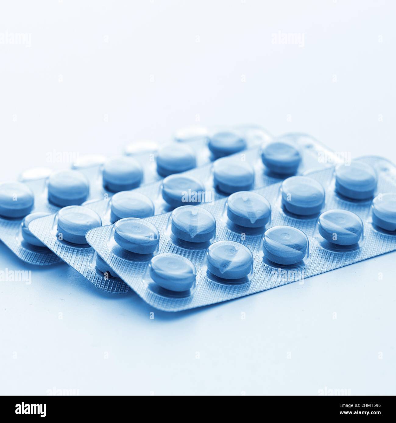 Tablets pills packaging pharmacy medicine medical on blue white ...