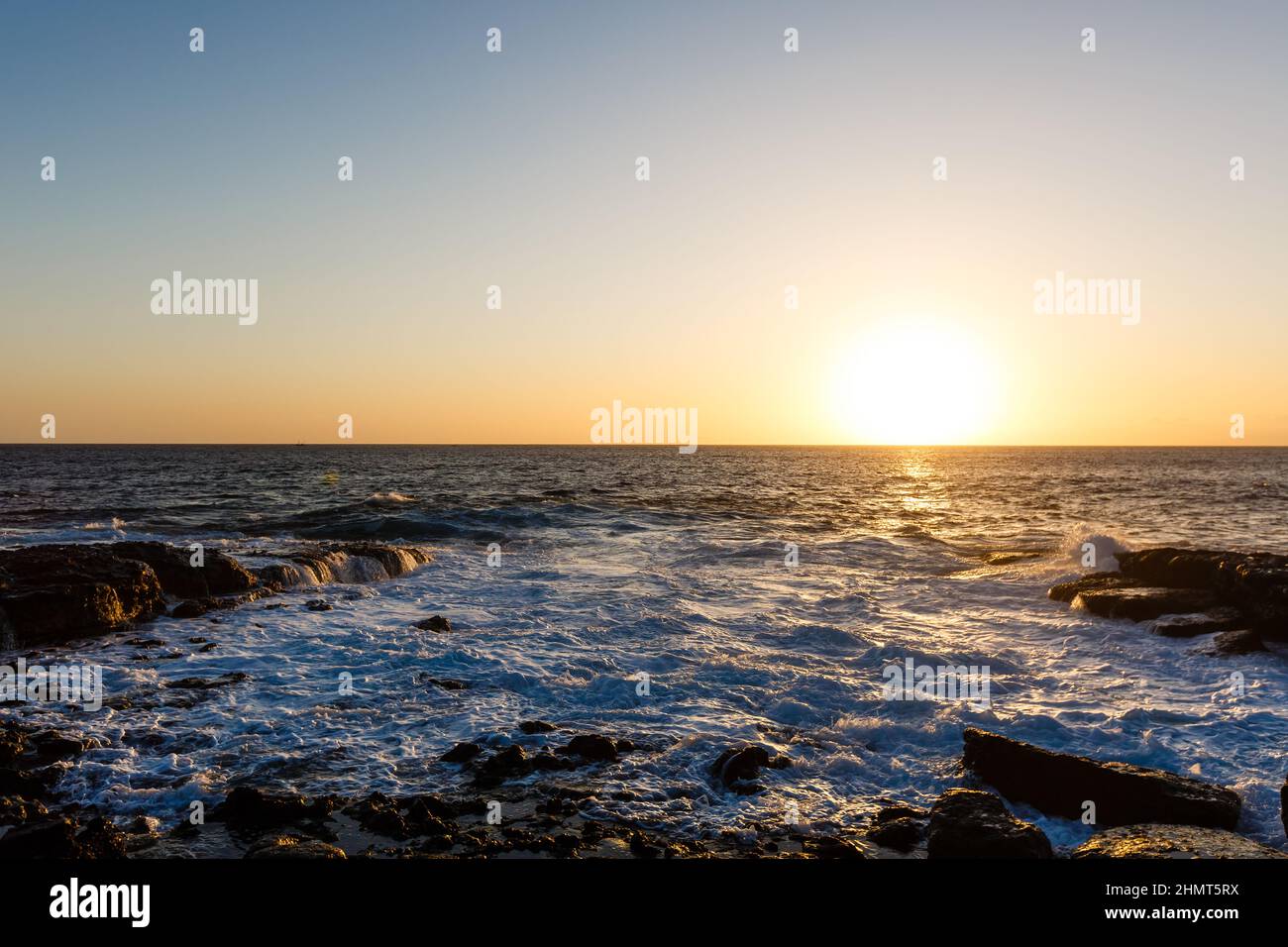quiet sea coast with stones at the twilight, natural sea background ...
