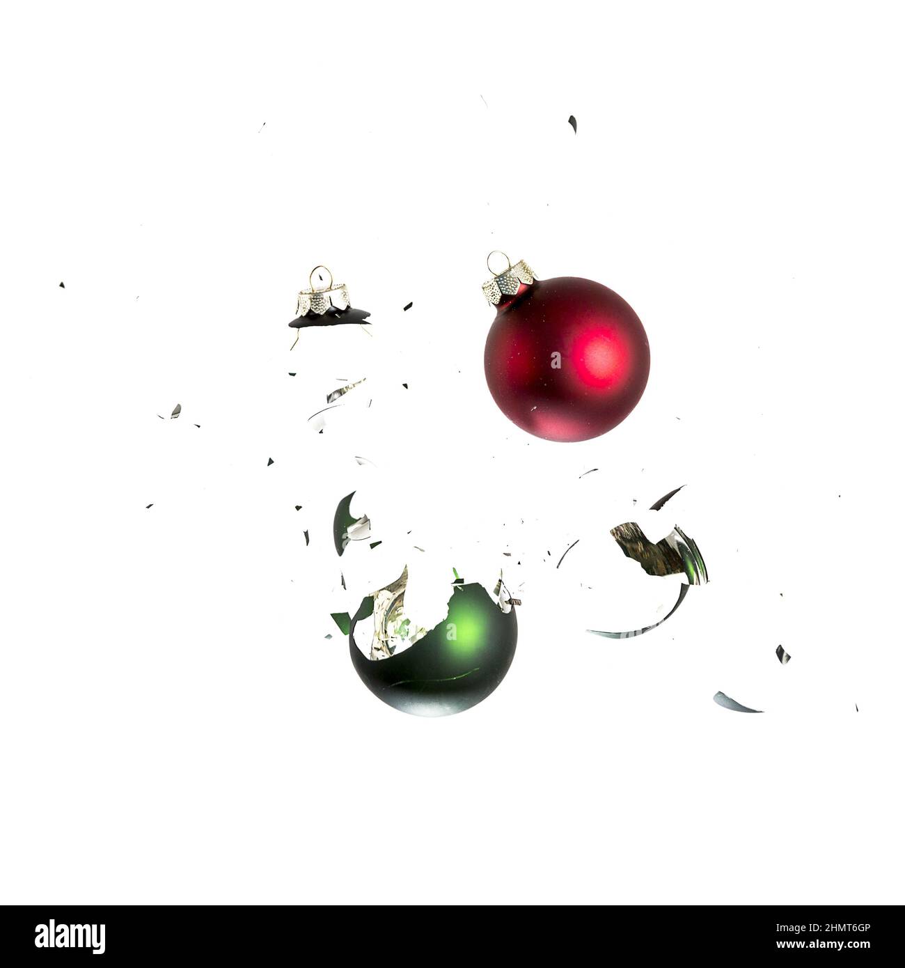 red and green christmas balls impact Stock Photo - Alamy