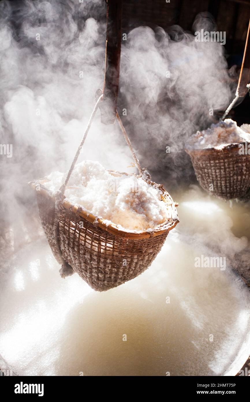 Ancient method of boiling brine into pure salt in Bo Kluea, Nan ...