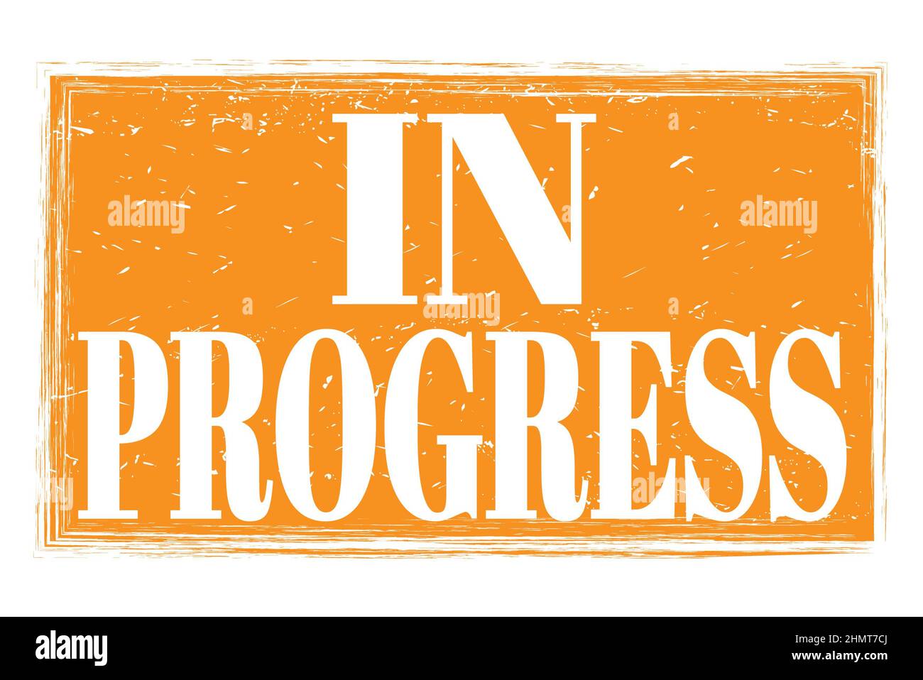 IN PROGRESS, words written on orange grungy stamp sign Stock Photo - Alamy