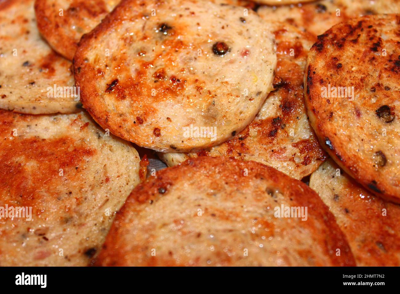 Shallow fried chicken salami Stock Photo - Alamy
