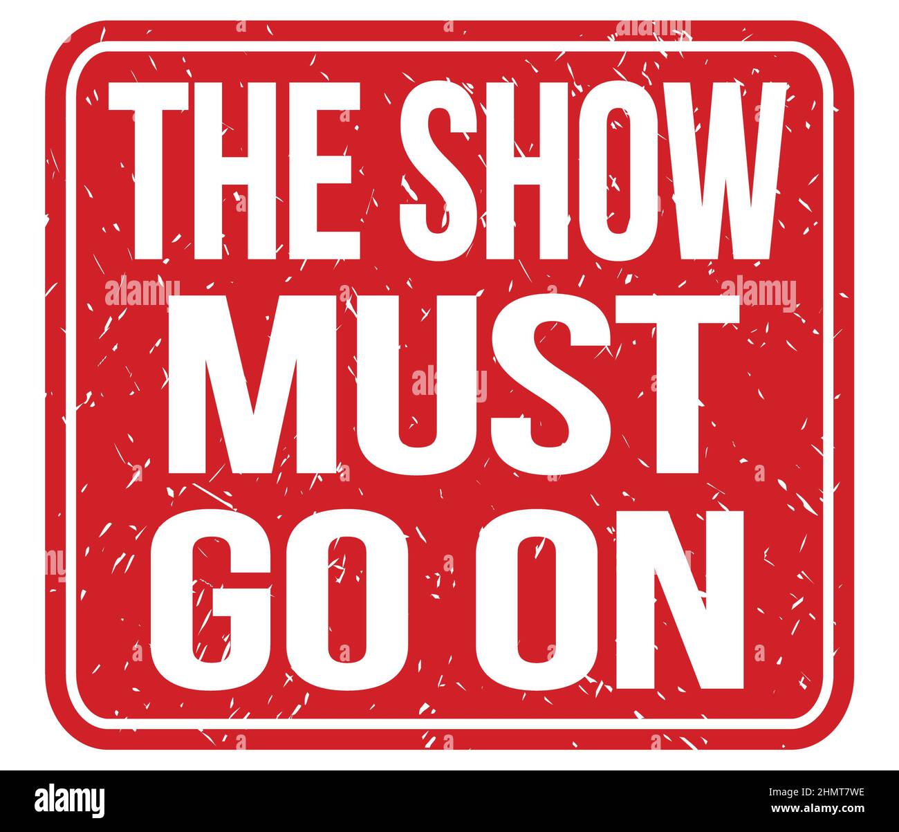 THE SHOW MUST GO ON, text written on red vintage stamp sign Stock Photo ...