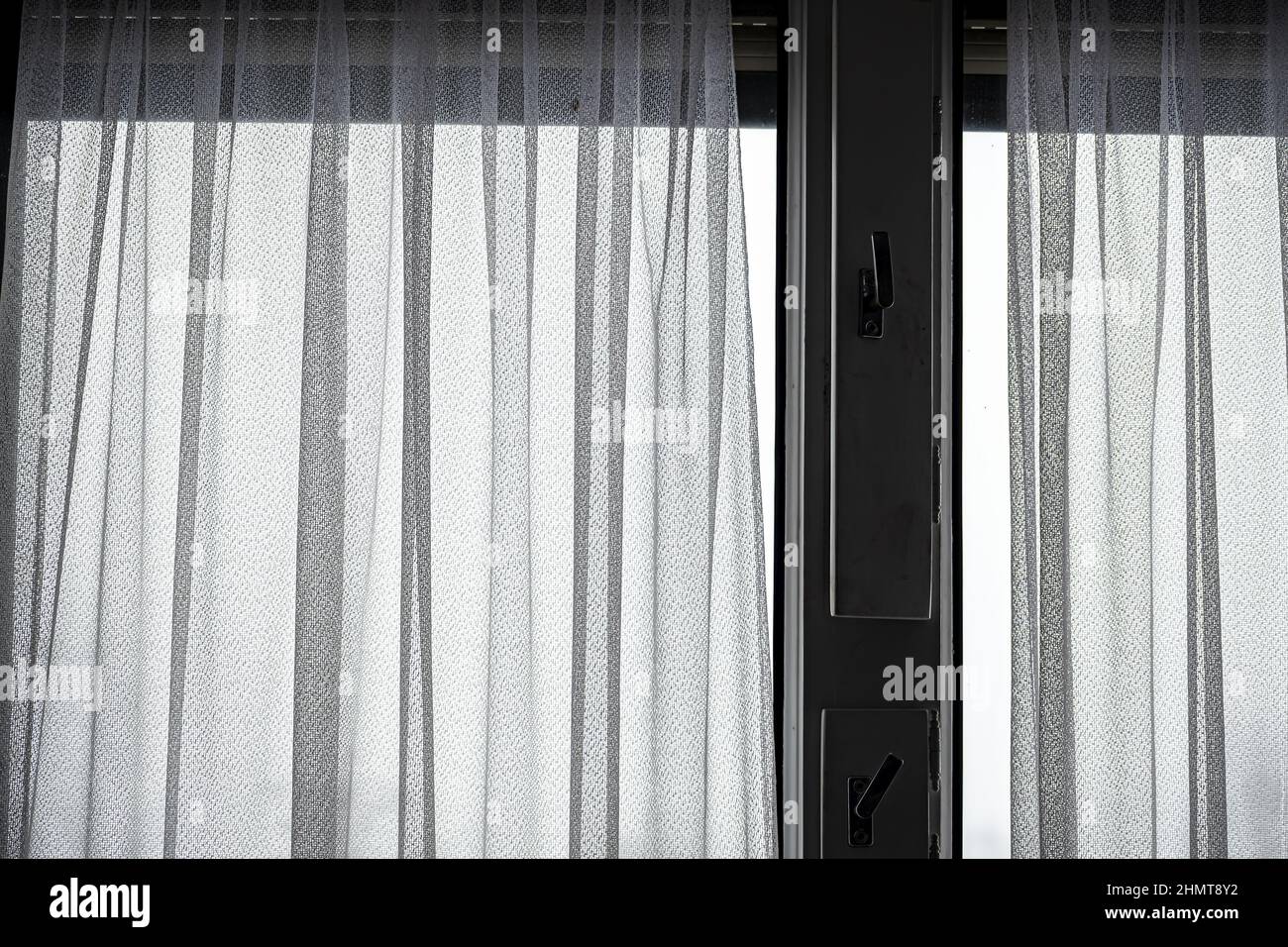 White closed curtains on a window Stock Photo - Alamy