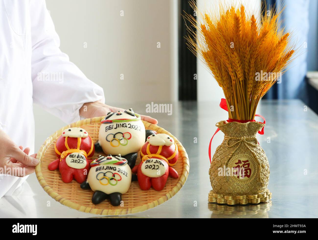 ZOUPING, CHINA - FEBRUARY 12, 2022 - Bakers make steamed buns shaped ...