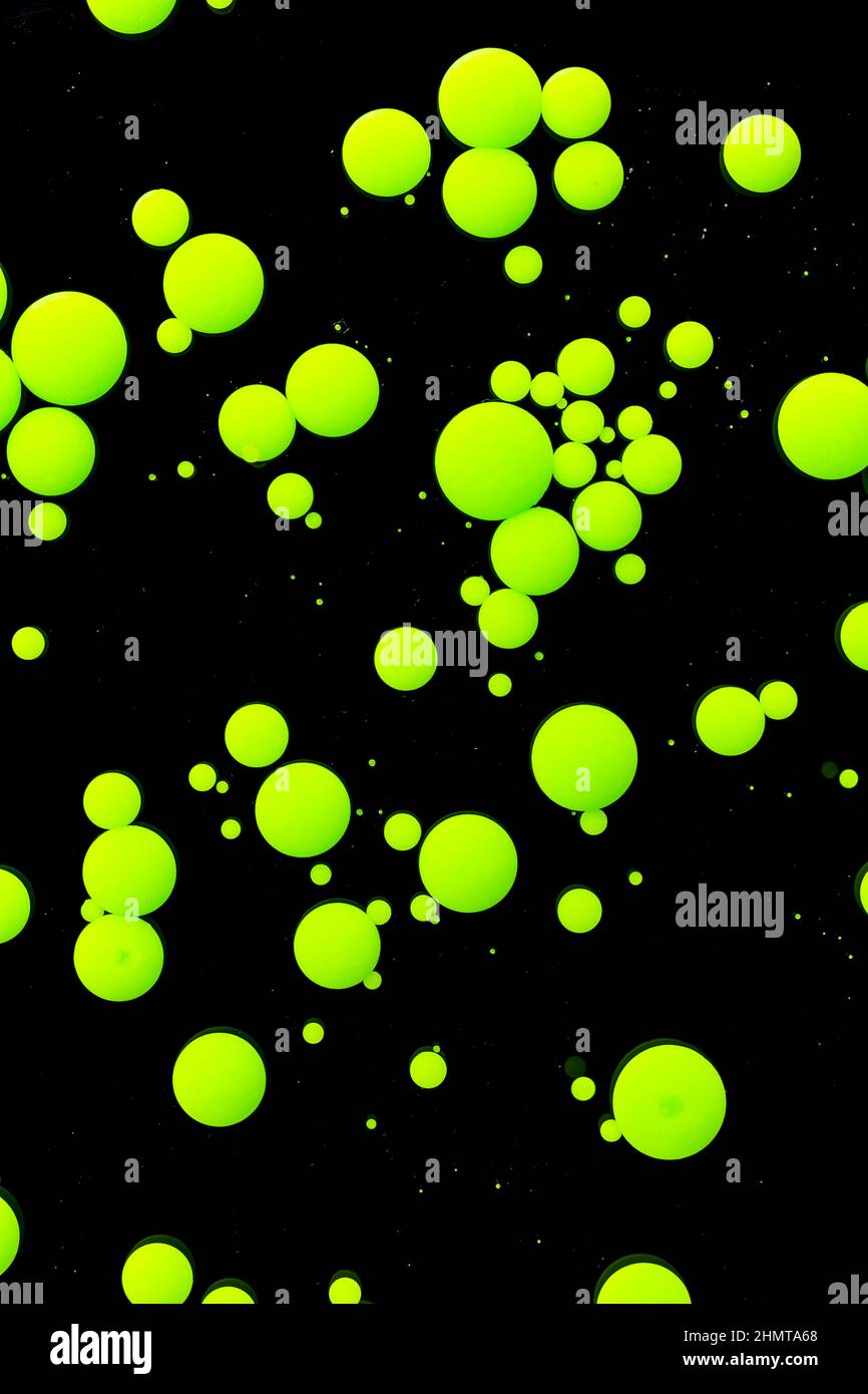 green Oil Painting bullets on black Stock Photo - Alamy