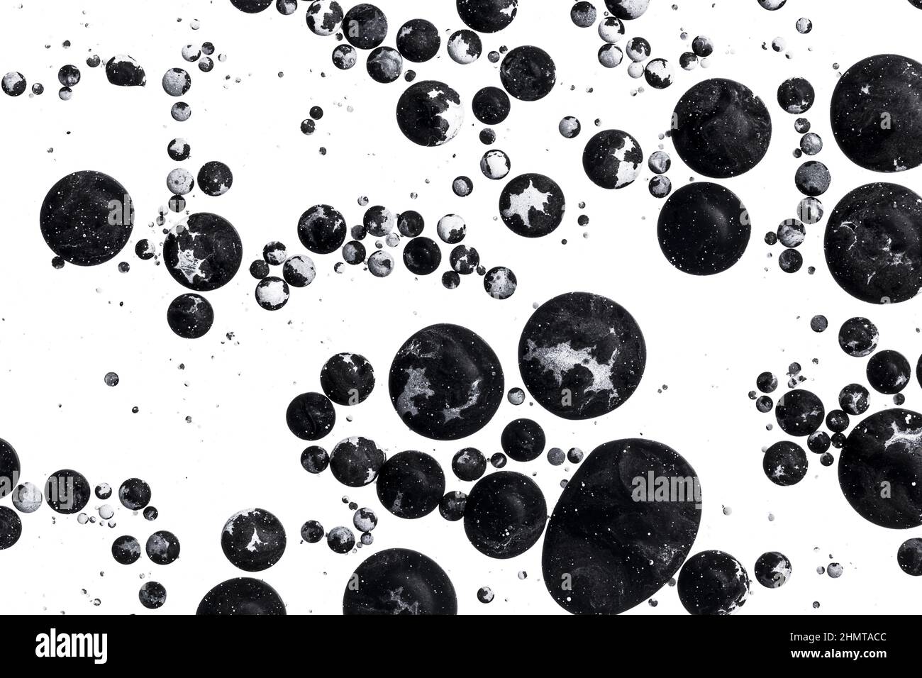 black and white ink color balls Stock Photo - Alamy