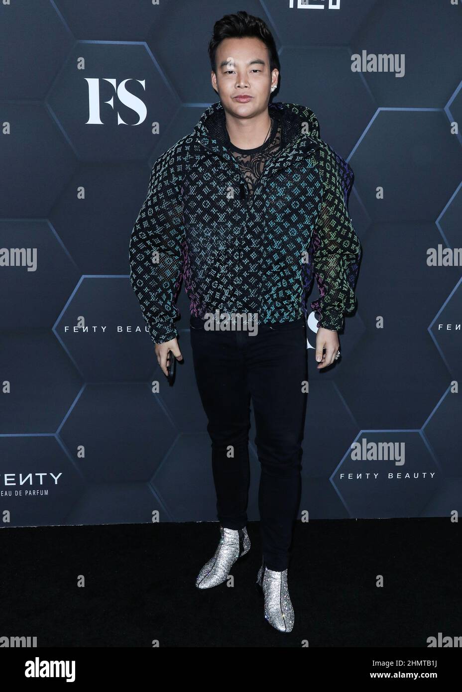 HOLLYWOOD, LOS ANGELES, CALIFORNIA, USA - FEBRUARY 11: Kane Lim arrives ...